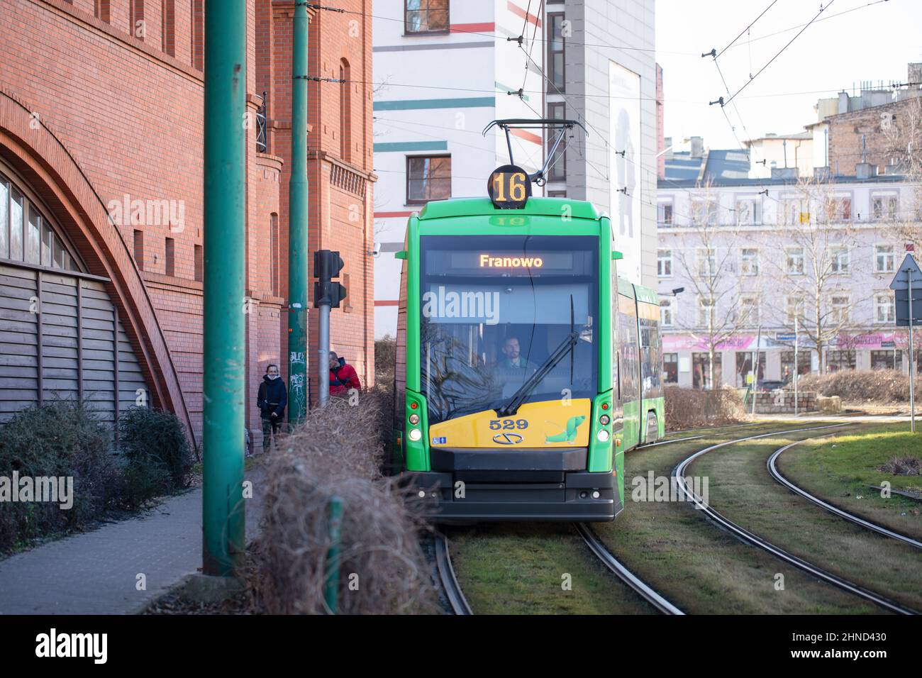 Poznan, Poland - tram on the street. Architecture of the city in ...