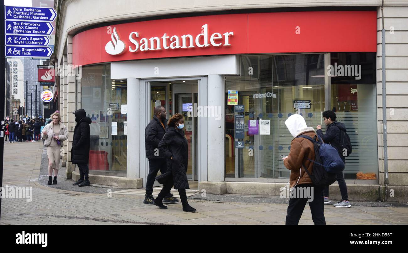 People walk past Santander Bank, Manchester, England, UK Stock Photo ...