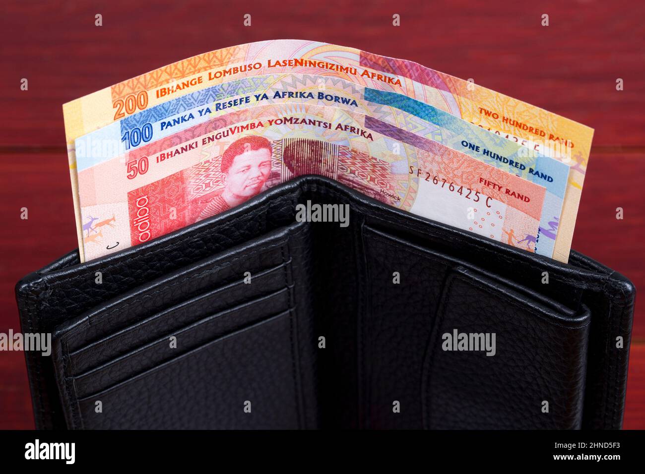 South African money- Rand in the black wallet Stock Photo - Alamy