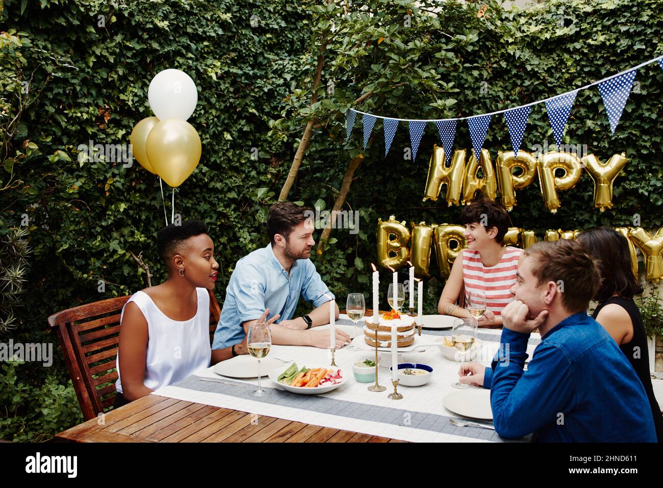 Celebrating with friends Stock Photo - Alamy