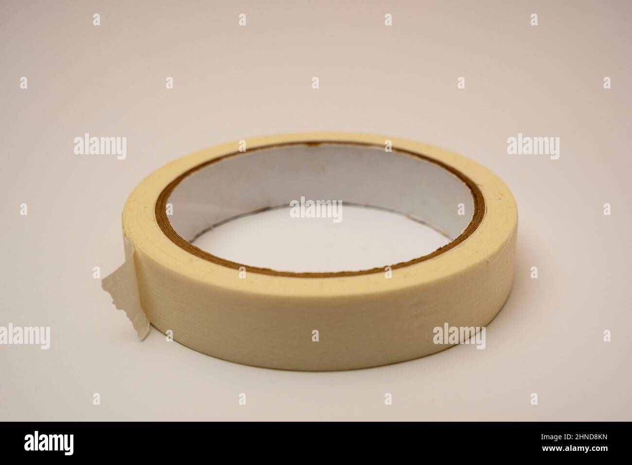 a roll of sticky adhesive tape on a white background, a place to copy ...