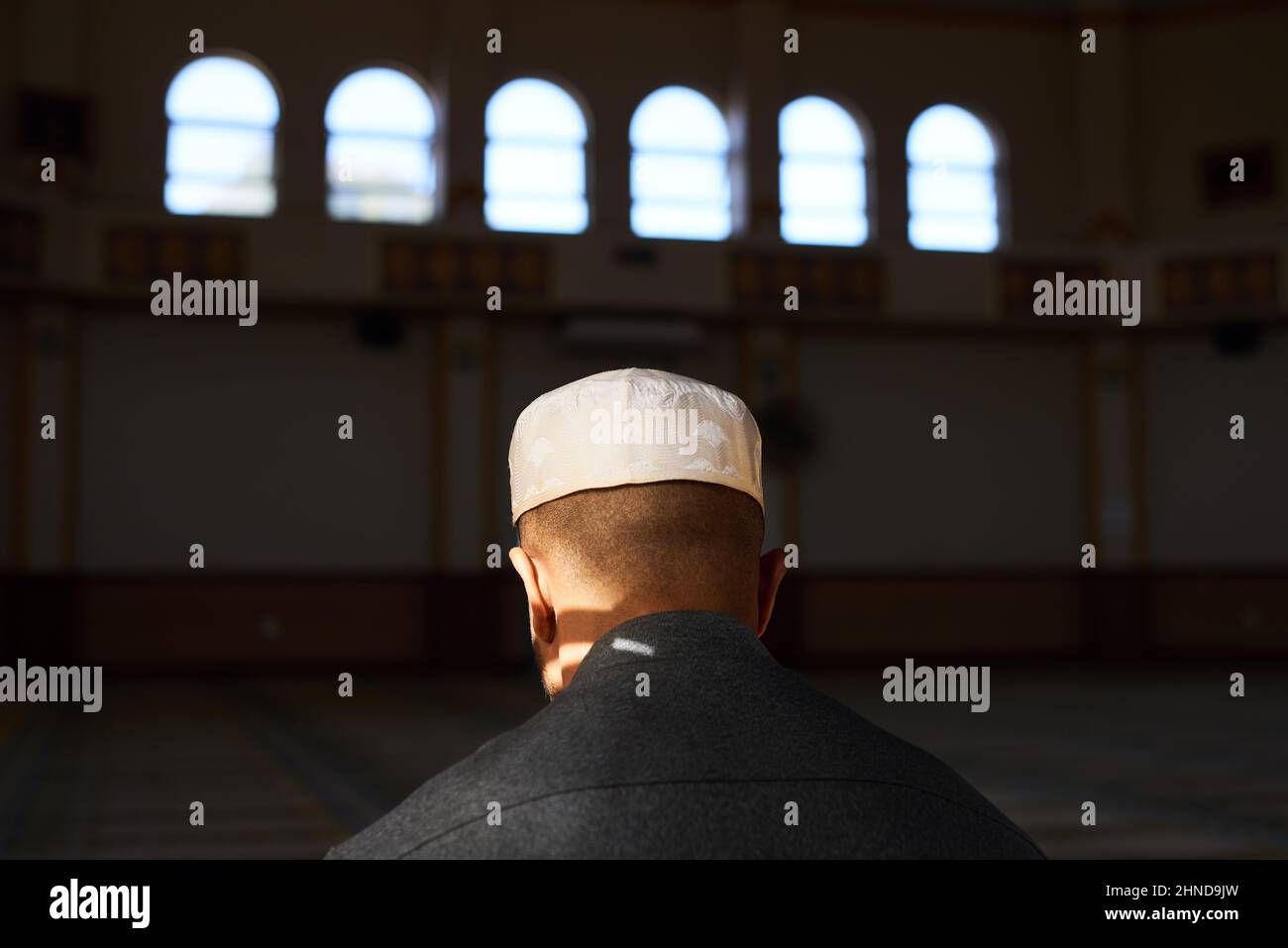 Back view of a young Muslim man's head while he prays in a mosque Stock ...