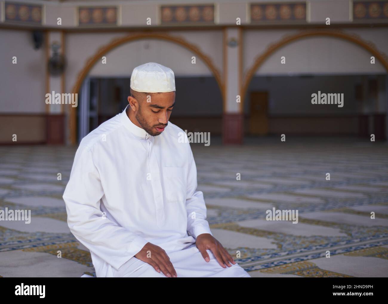 Muslim man praying in mosque hi-res stock photography and images - Alamy