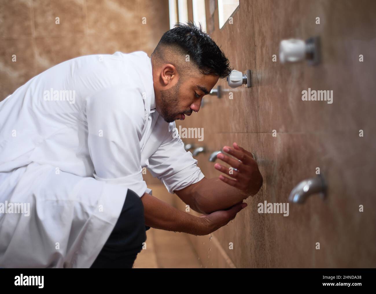 Wudu washing hands hi-res stock photography and images - Alamy