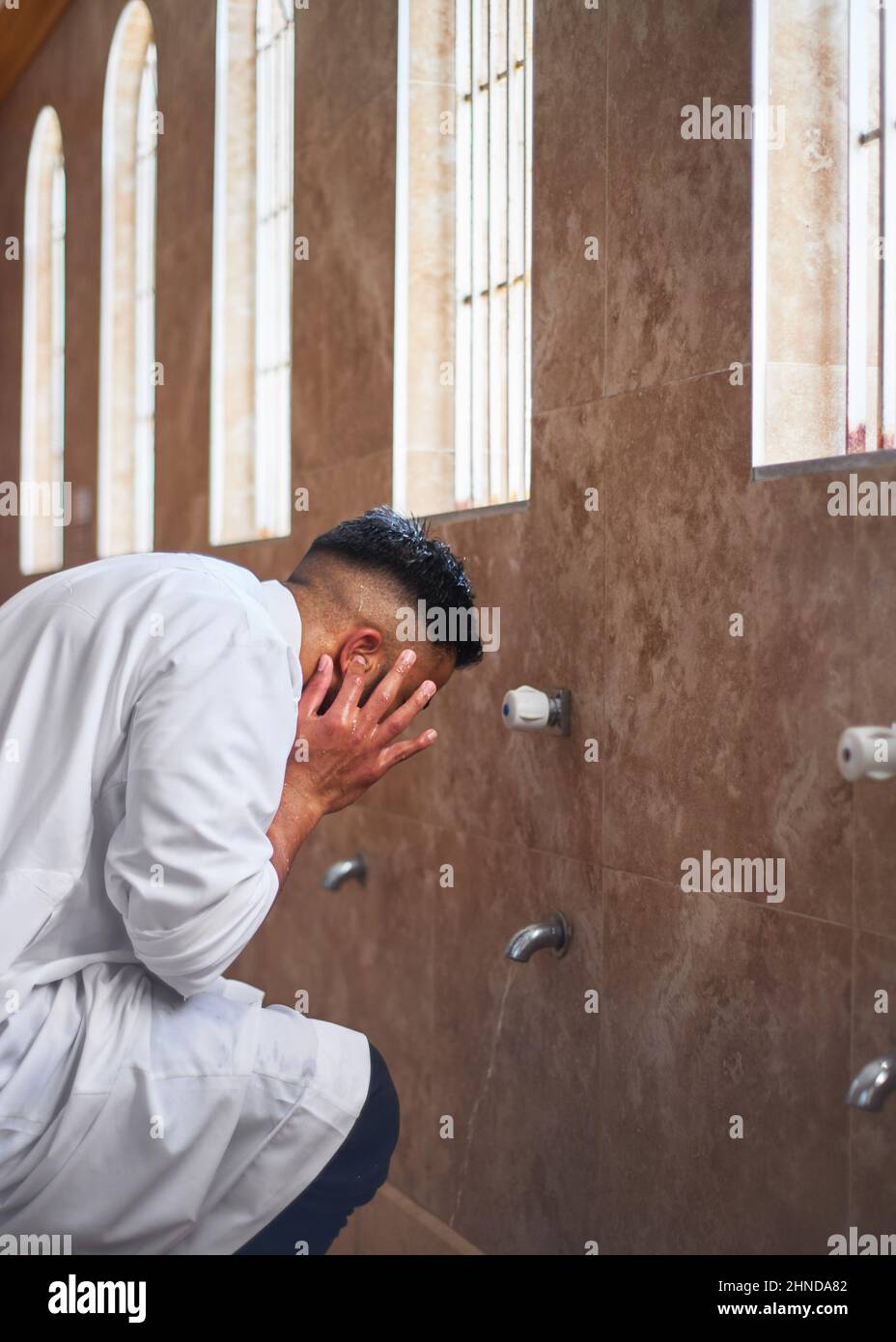 Wudu washing hands hi-res stock photography and images - Alamy