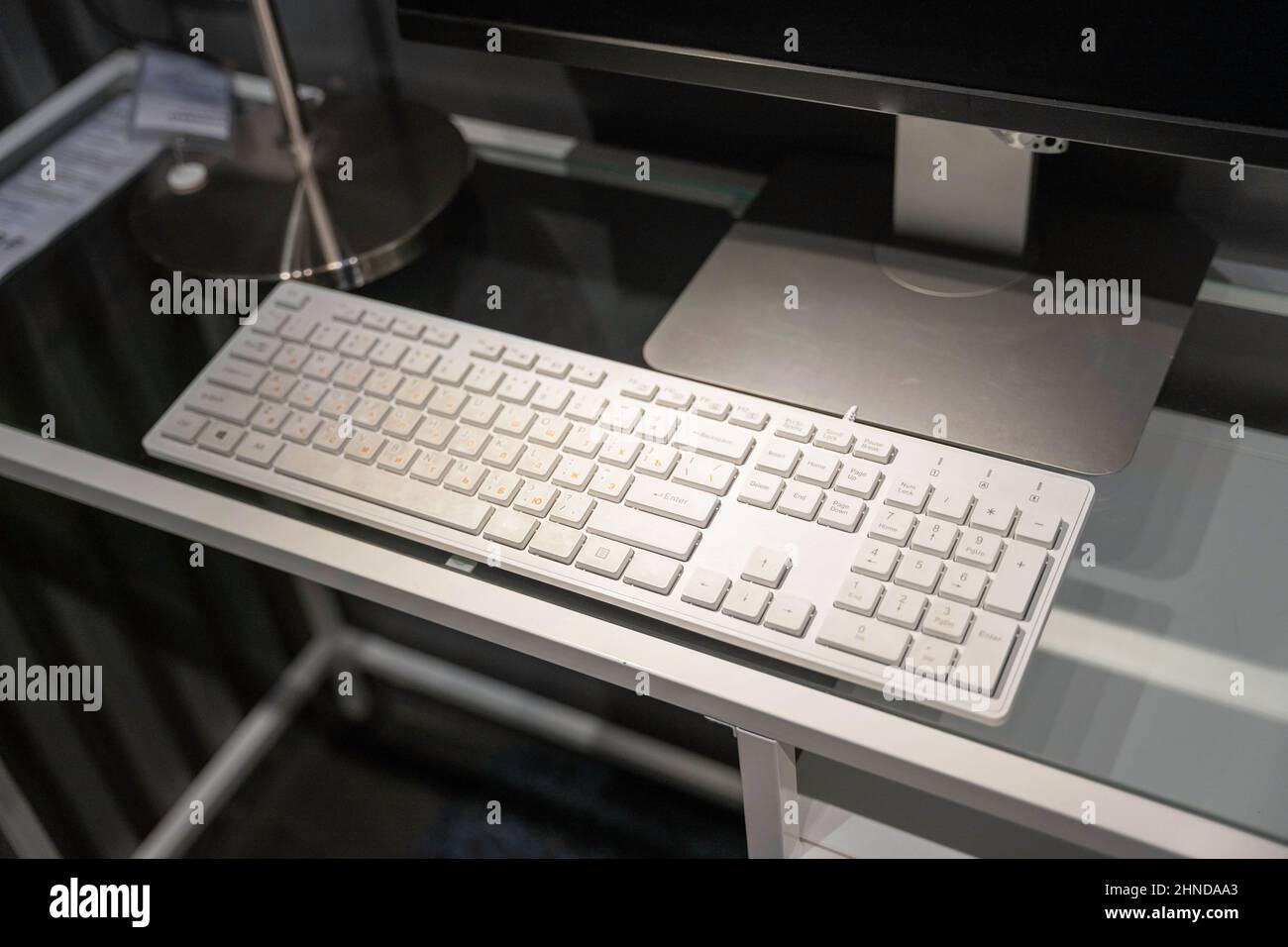 the keyboard of a stationary computer on a desk in the office or at ...
