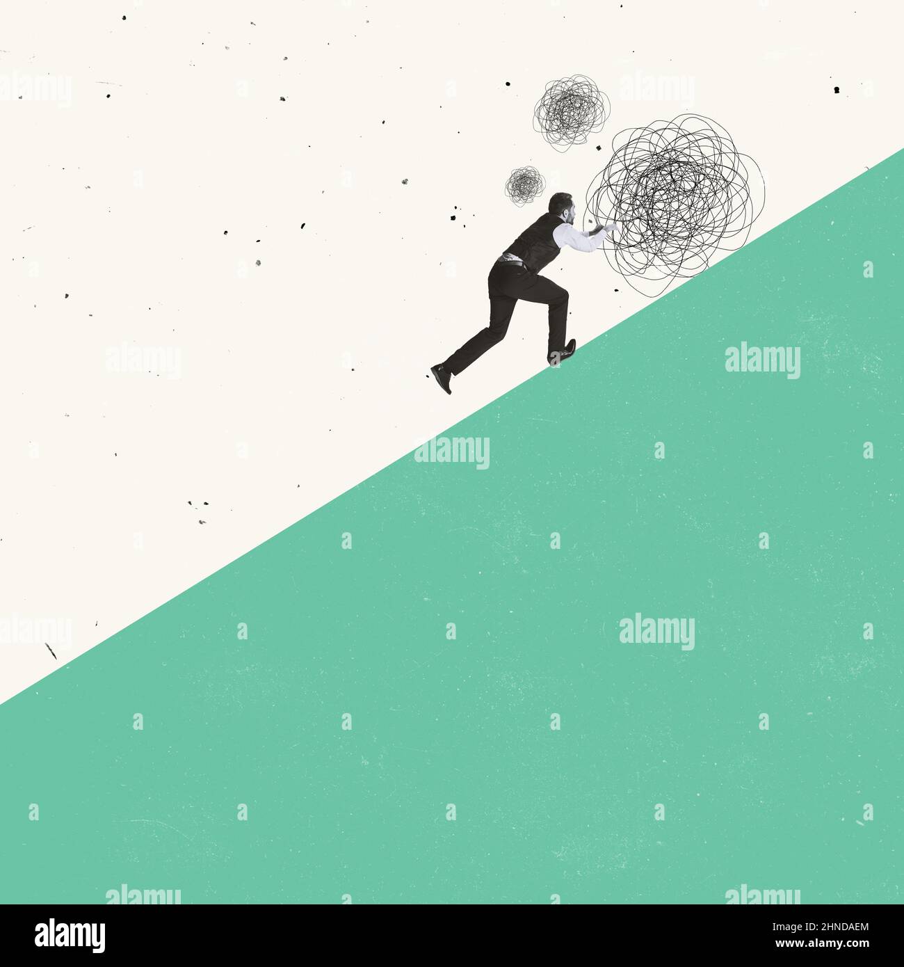 Creative design. Businessman, employee pushing forward big tangled ball ...