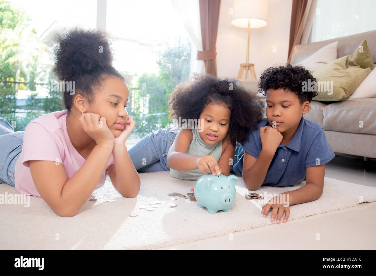 Boy girl counting money hi-res stock photography and images - Alamy