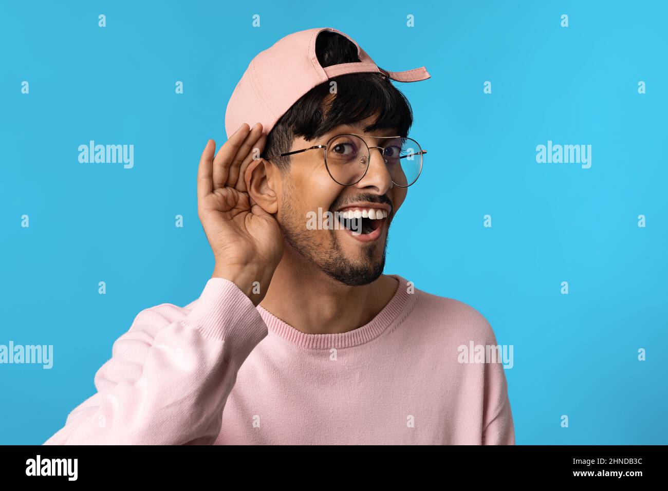 Excited smiling guy holding hi-res stock photography and images - Alamy