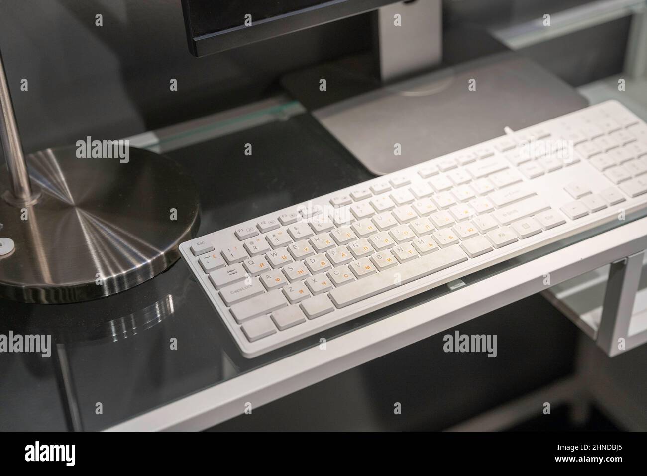 the keyboard of a stationary computer on a desk in the office or at ...