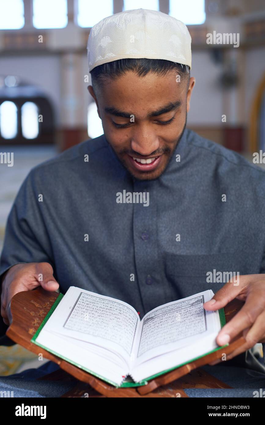 Muslim man reading quran in the mosque hi-res stock photography and ...