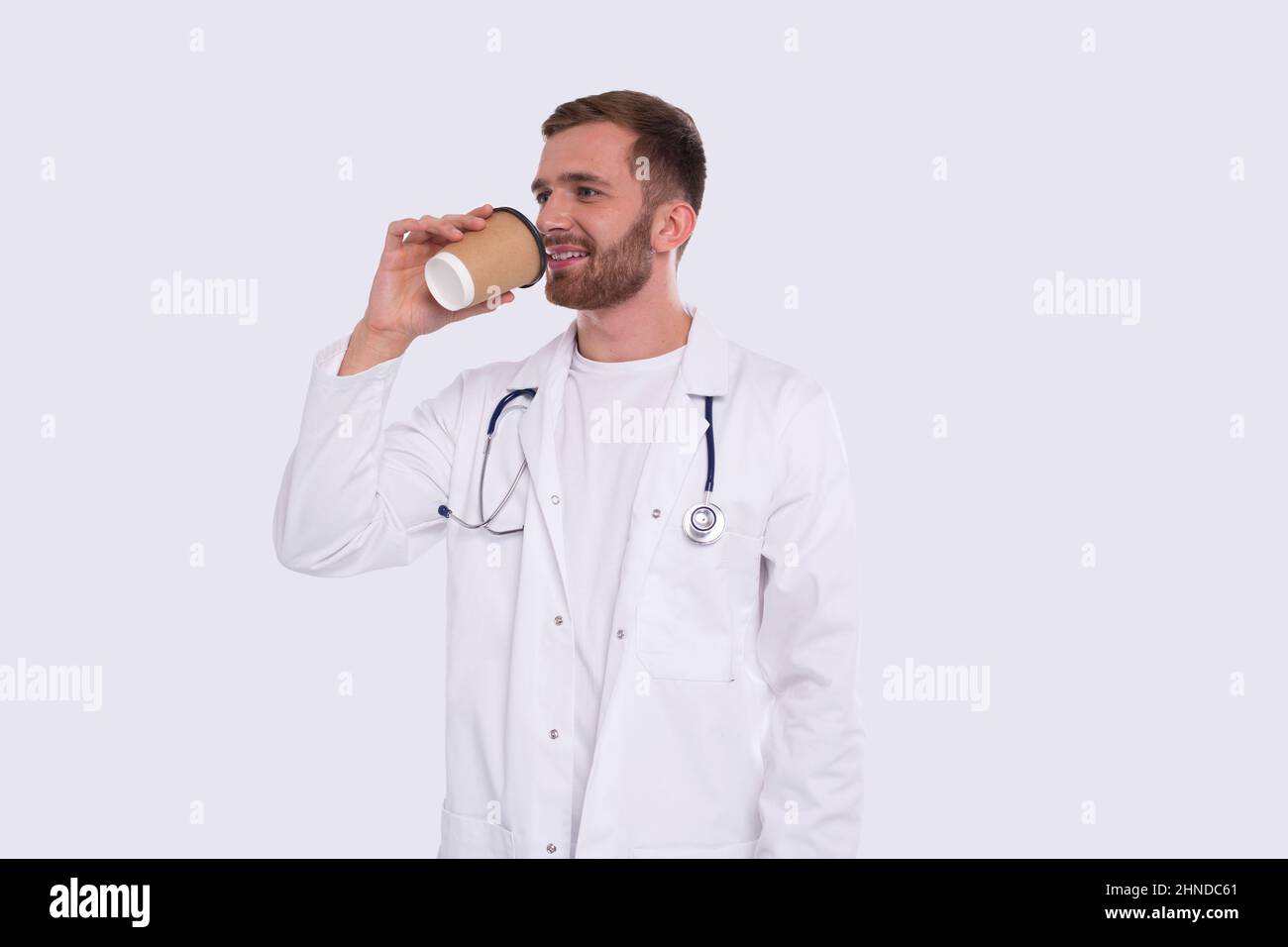 Doctor Holding Coffee in To Go Cup. Man With Take Away Coffee Cup ...