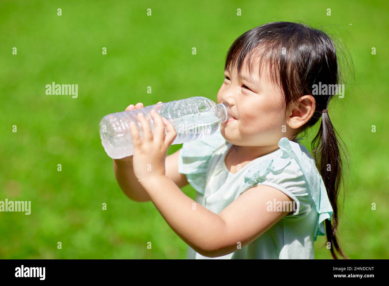 Japanese Girl Drinking Water Stock Photo - Alamy