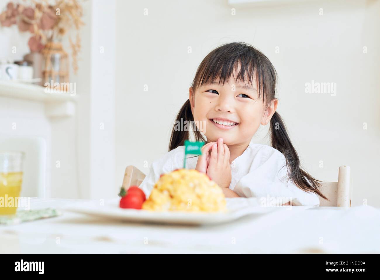 Child eating rice hands hi-res stock photography and images - Alamy