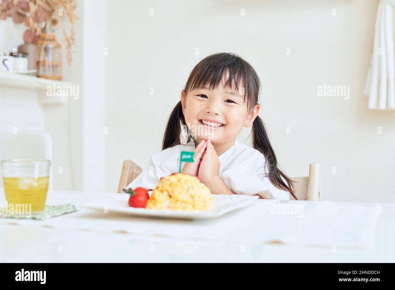 Child eating rice hands hi-res stock photography and images - Alamy