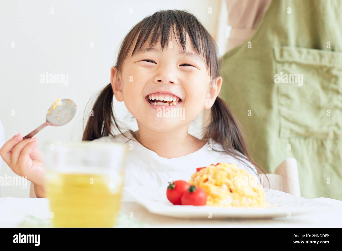Japanese Girl Eating Rice Stock Photo - Alamy