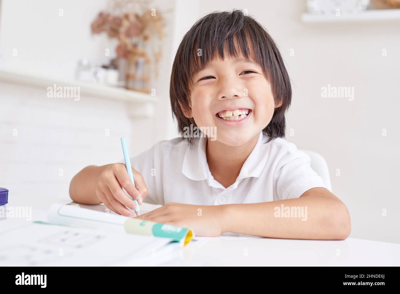 Japanese Elementary School Boy Doing His Homework Stock Photo - Alamy