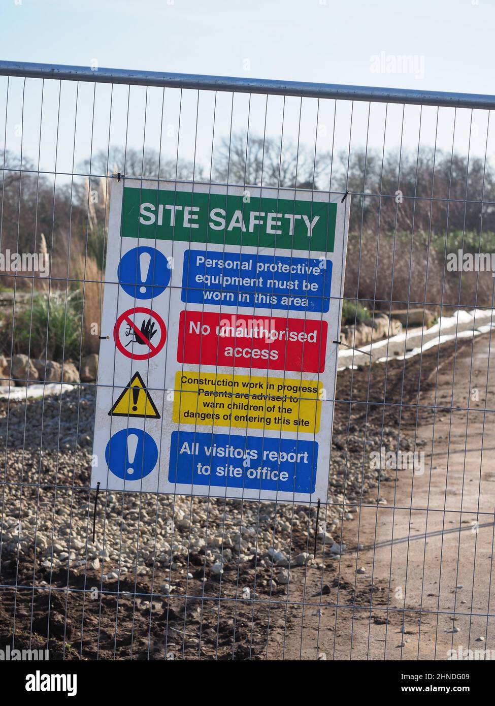 a close up of a site safety warning sign on a metal barrier Stock Photo ...