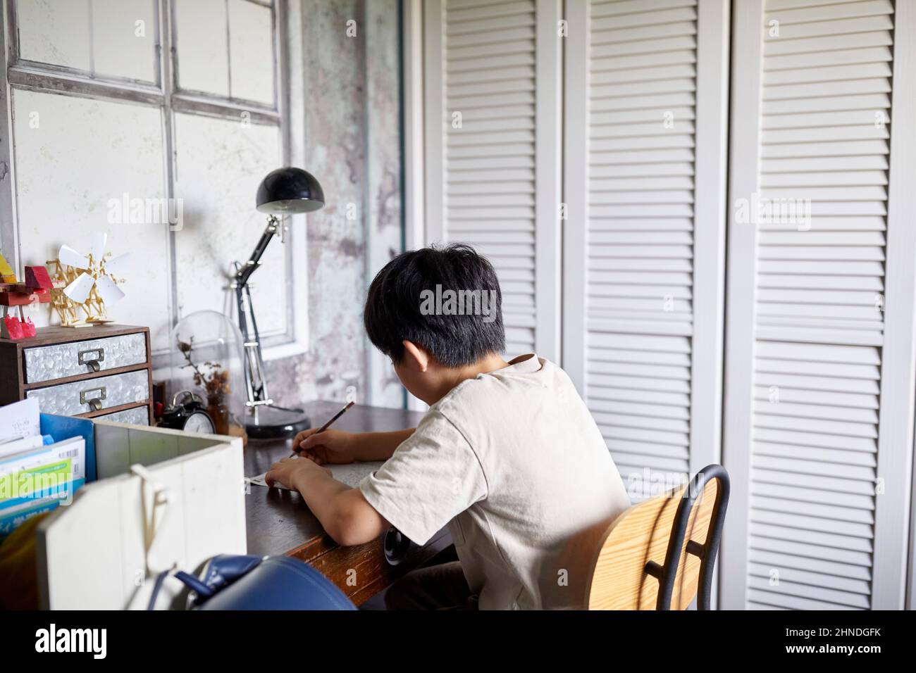 Japanese Boy Doing His Homework Stock Photo - Alamy