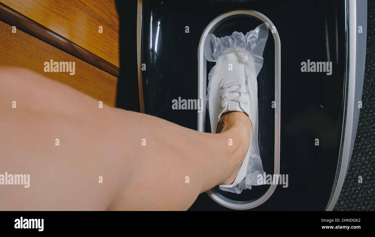 Automatic Thermal Shrinkable Shoe Cover Laminating Machine. Close up ...