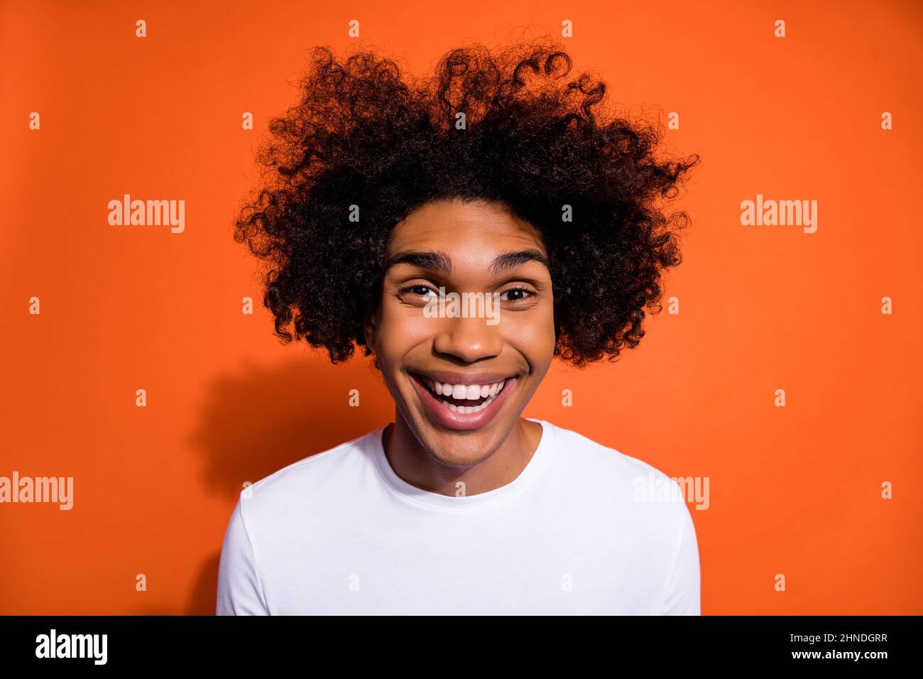 Photo of cute excited funny guy dressed white shirt smiling laughing ...