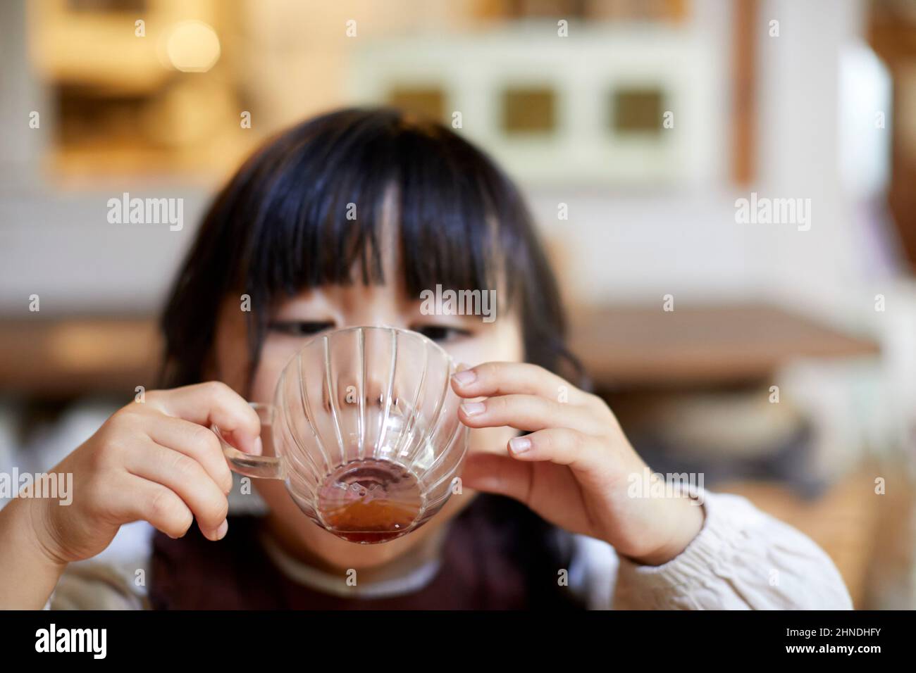 Japanese Girl Drinking Tea Stock Photo - Alamy