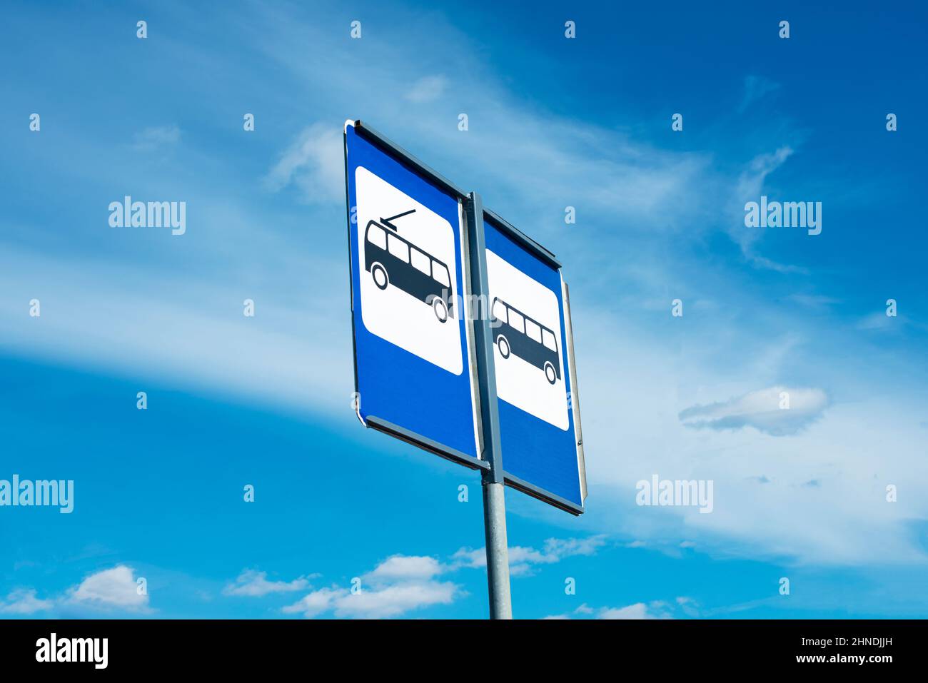 The bus stop sign on blue background on the beautiful sky Stock Photo ...