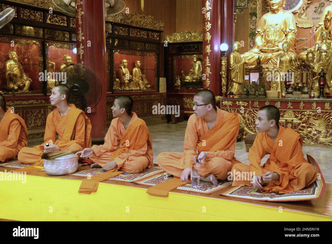 Offerings in a Buddhist temple Stock Photo - Alamy