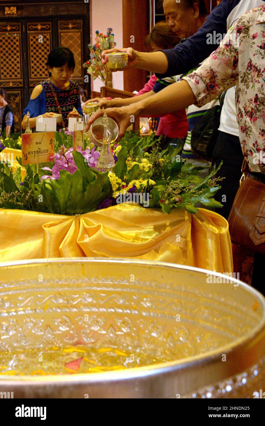 Offerings in a Buddhist temple Stock Photo - Alamy
