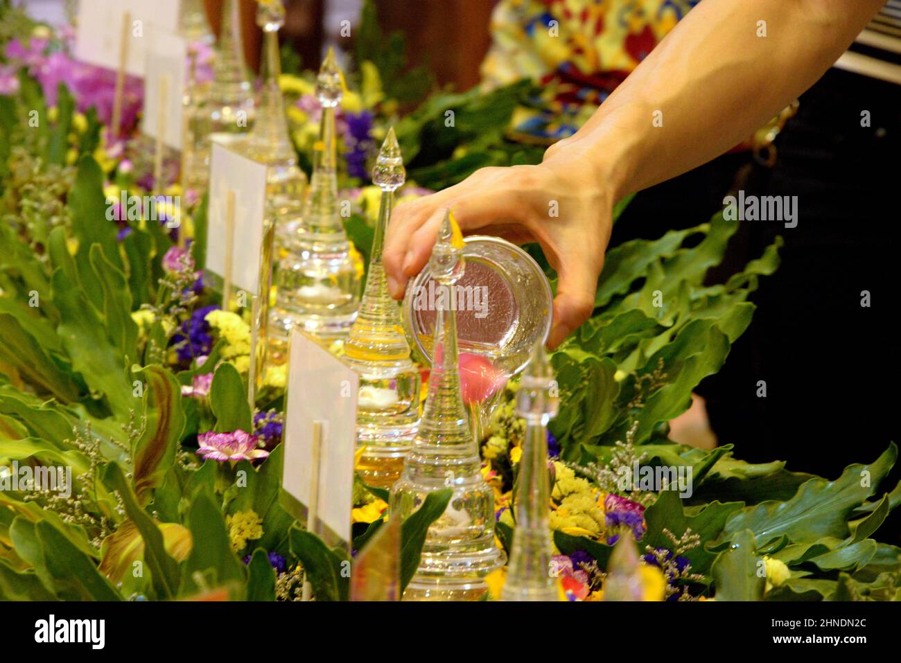 Offerings in a Buddhist temple Stock Photo - Alamy