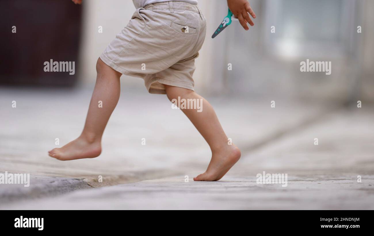 Child walking on tiptoes Stock Photo - Alamy
