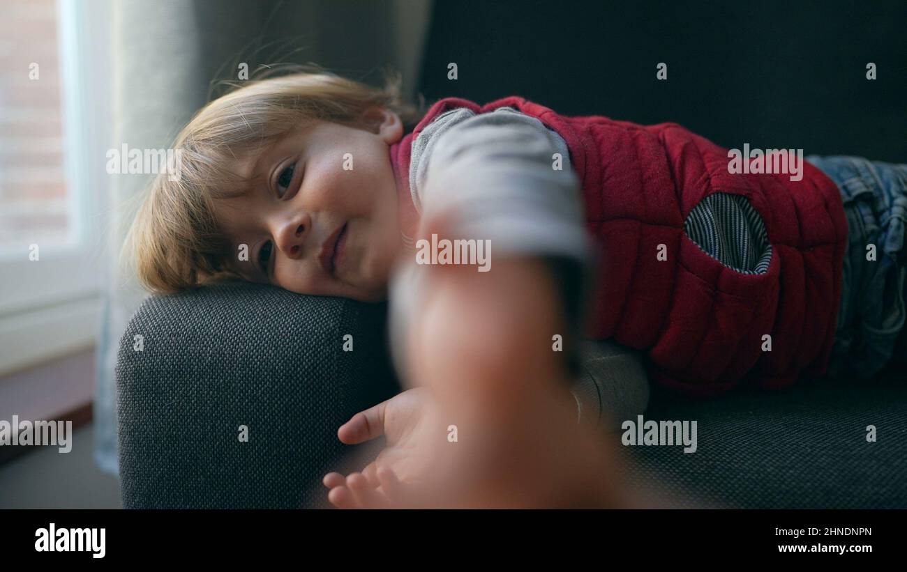 Cute child pushing camera away toddler wanting to touch lens Stock ...