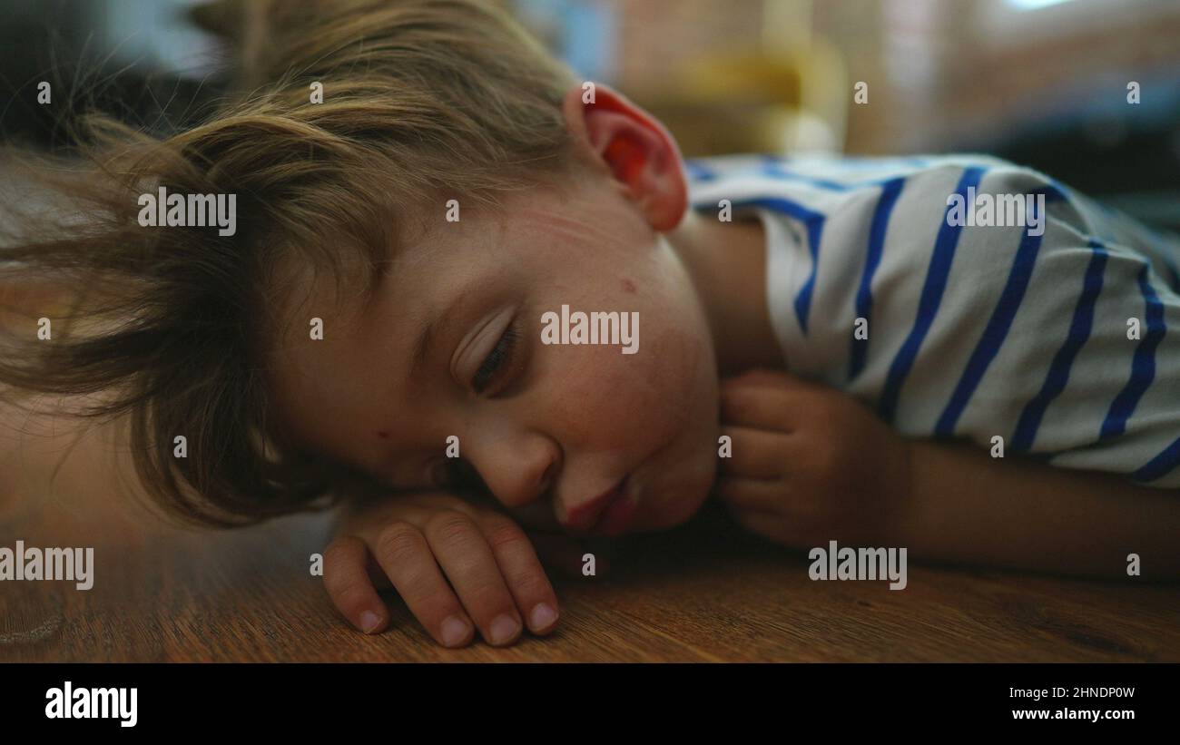 Drowsy child waking up from nap little boy awakening from sleep Stock ...