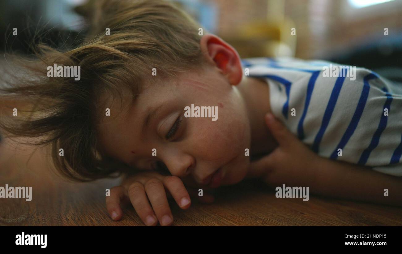 Drowsy child waking up from nap little boy awakening from sleep Stock ...