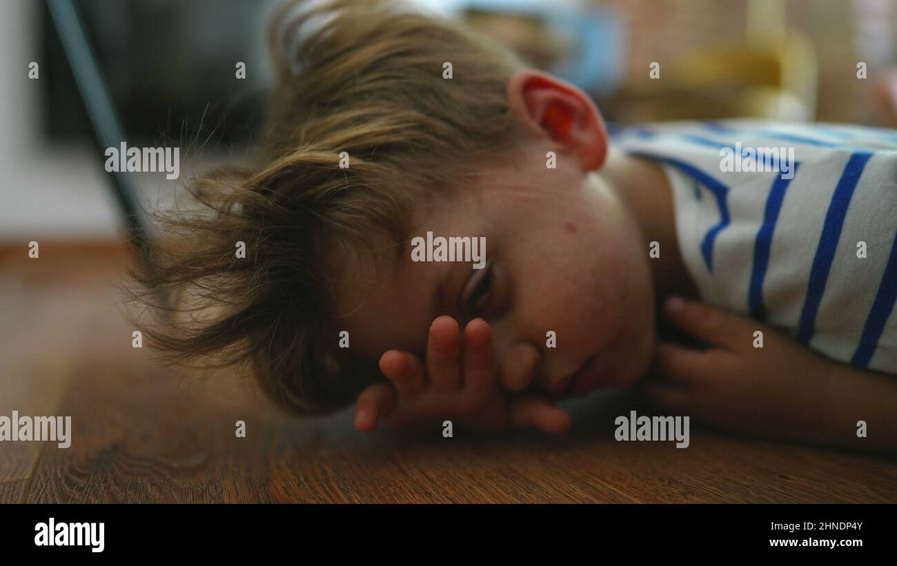 Kid waking up close-up face awake after nap Stock Photo - Alamy