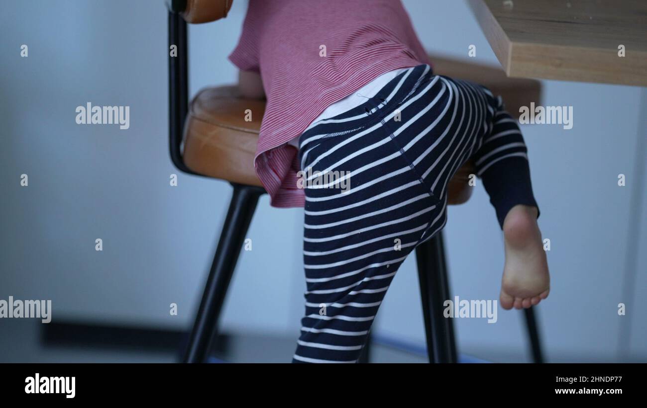 Child climbing chair hi-res stock photography and images - Alamy