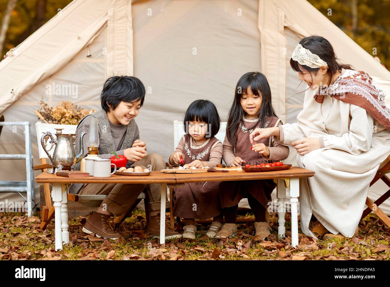 Japanese Family Making Camping Rice Stock Photo - Alamy