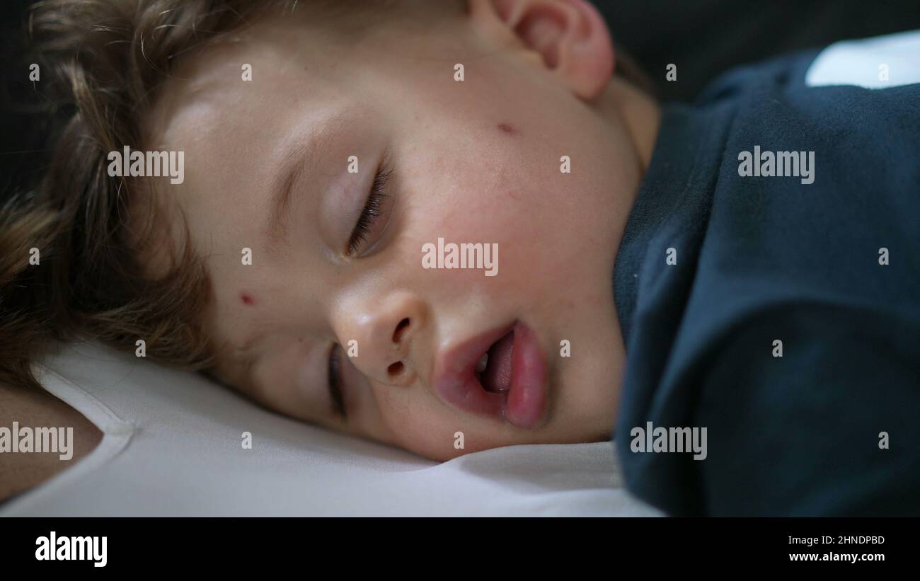 Little boy sleeping child asleep during nap time Stock Photo - Alamy