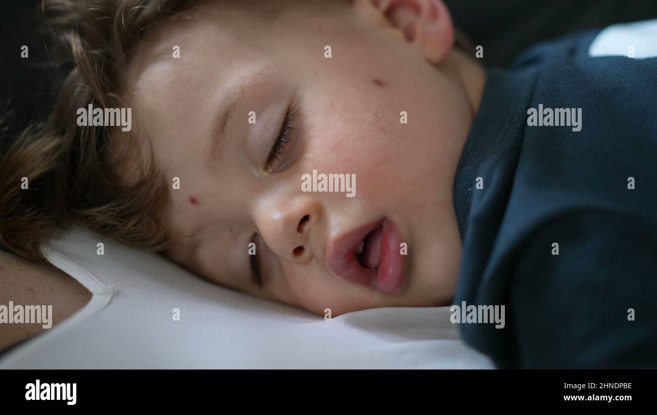 Little boy sleeping child asleep during nap time Stock Photo - Alamy