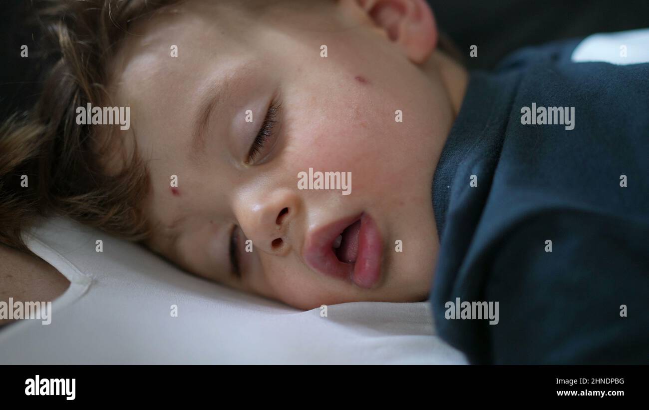 Little boy sleeping child asleep during nap time Stock Photo - Alamy