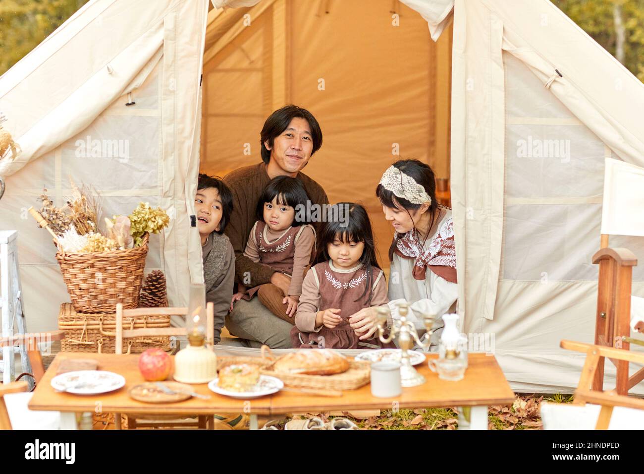 Japanese Family Taking A Commemorative Photo At The Campsite Stock ...
