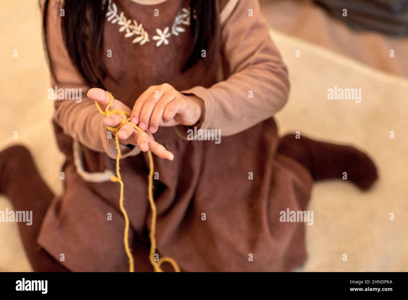 Japanese Girl Enjoying Playing Ayatori Stock Photo - Alamy