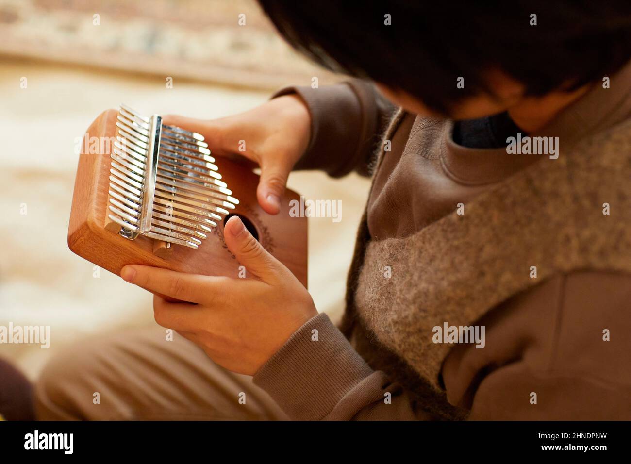 Japanese Boy Playing Kalimba Stock Photo - Alamy