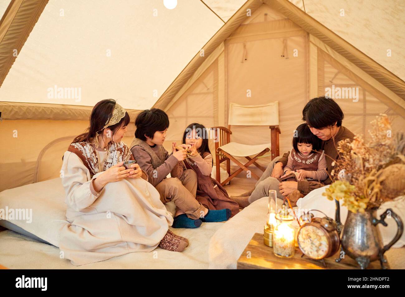 Japanese Family Enjoying Playing Ayatori Stock Photo - Alamy