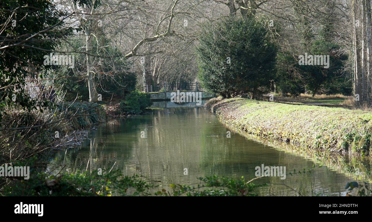 River walk at Lode Cambridgeshire with Bridge, stream and trees Stock ...