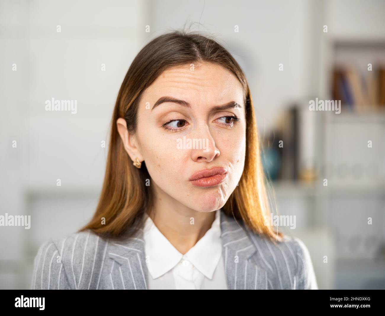 Business woman expresses different emotions while working in office ...