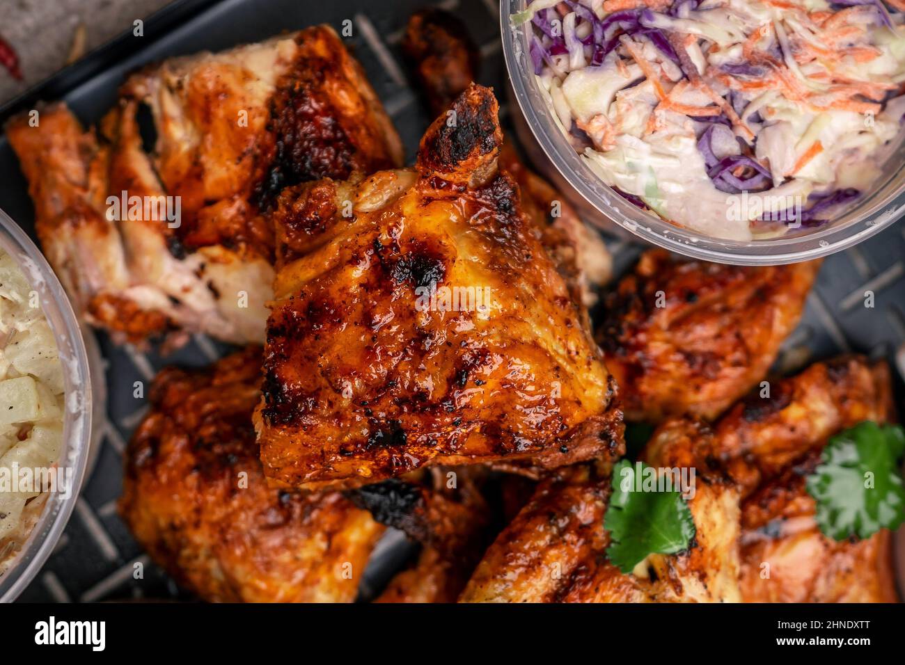 Lunch tray with salads and grilled chicken Stock Photo - Alamy
