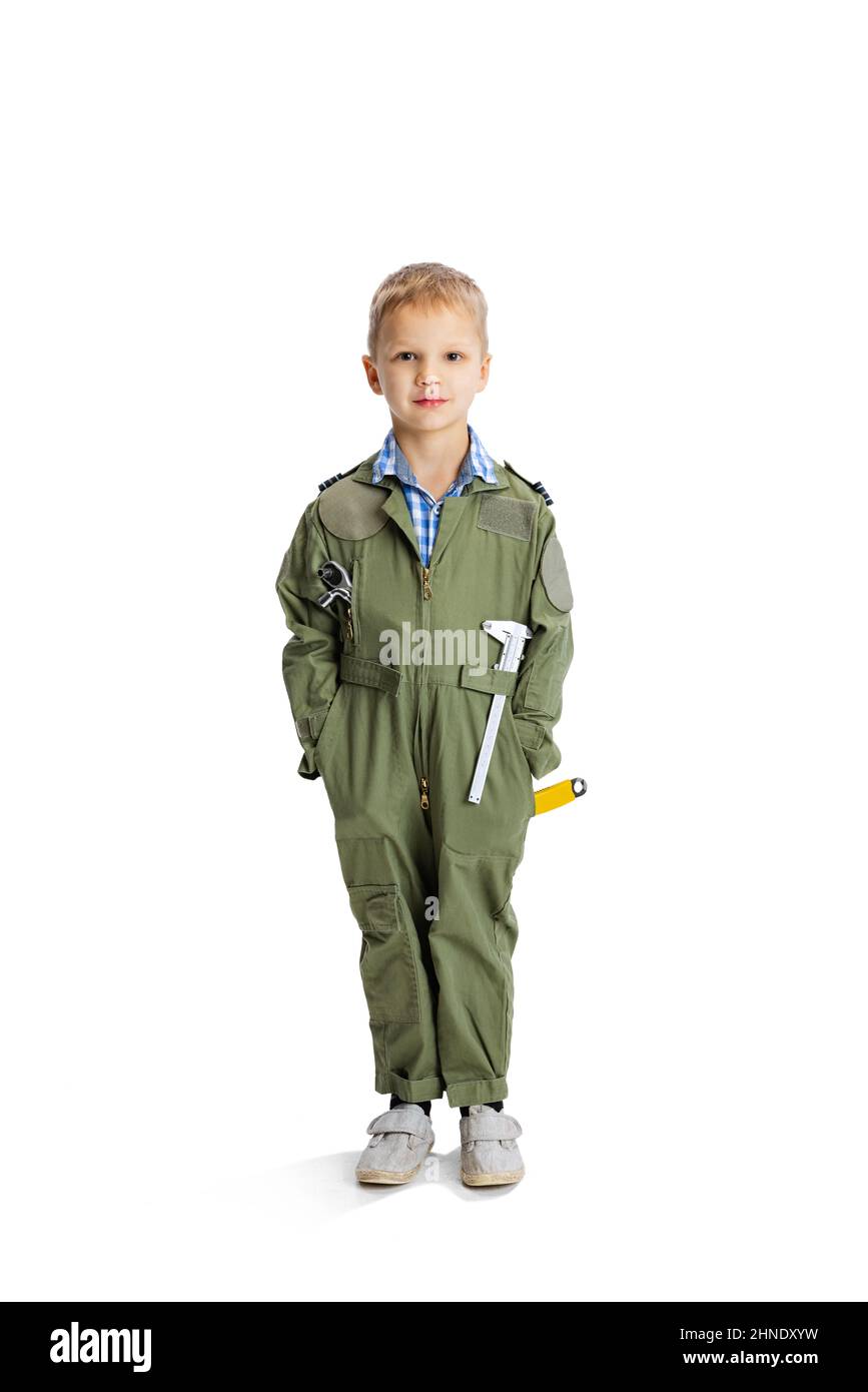 Portrait of little boy, cute kid in image of auto mechanic or fitter in ...