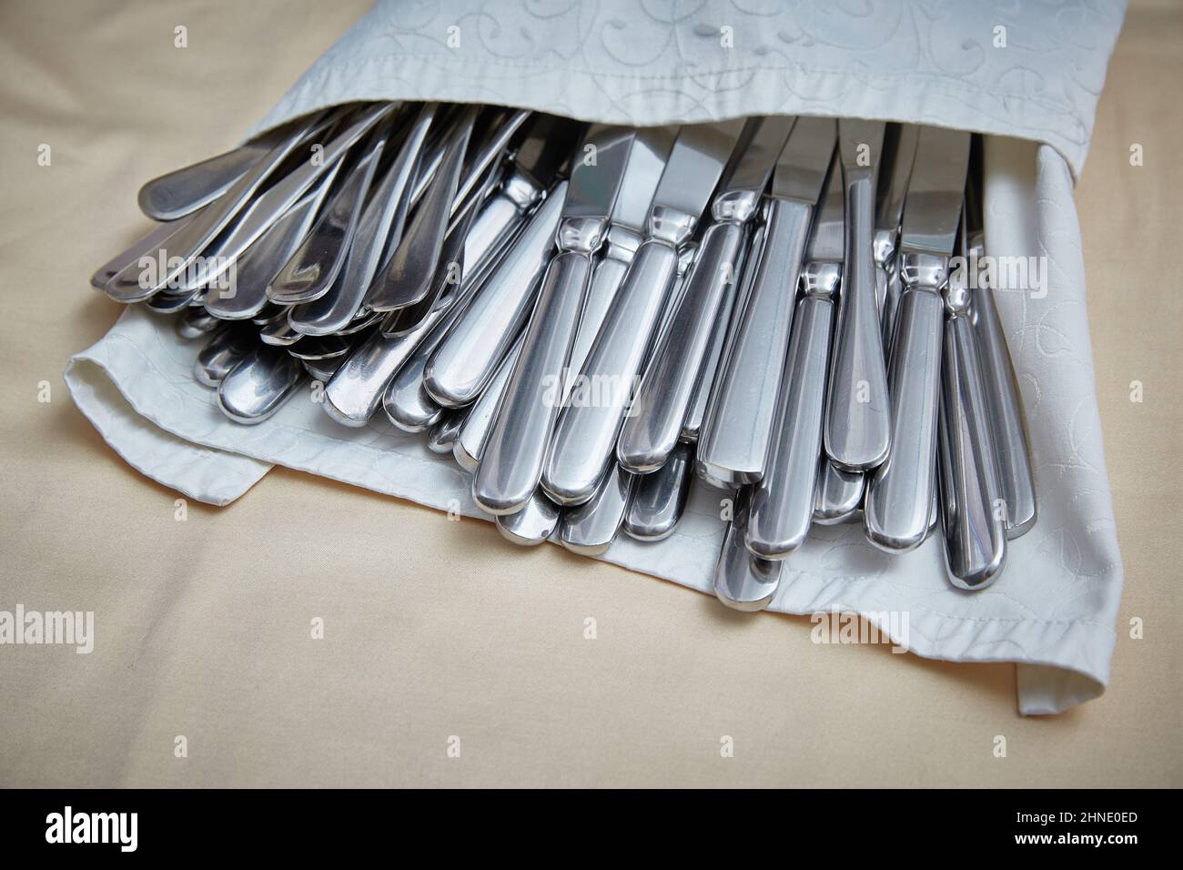 Cutlery in a restaurant at a wedding or a festive event Stock Photo - Alamy