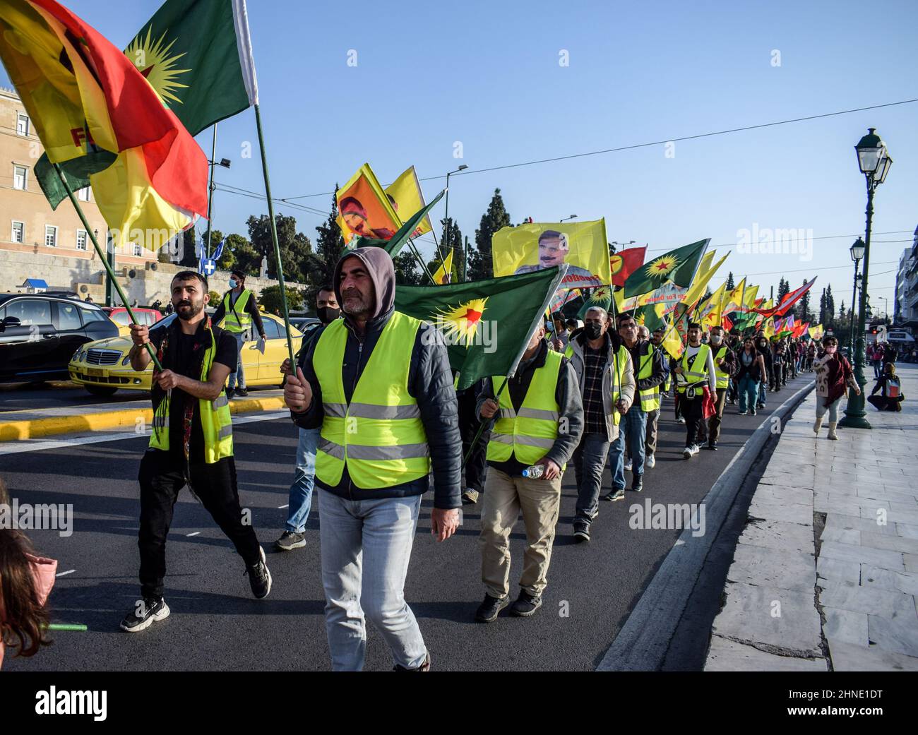 Kurdish activists march in the center of the Greek capital holding ...